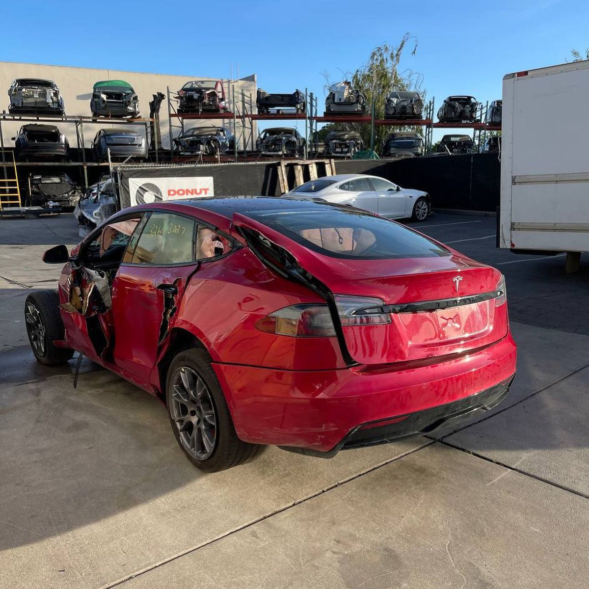 Tesla Parts Shop - Contact Us | Donut Auto Parts